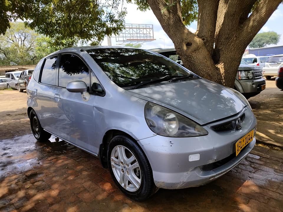 Honda Fit Old Shape Silver Small Car For Sale - SAVEMARI